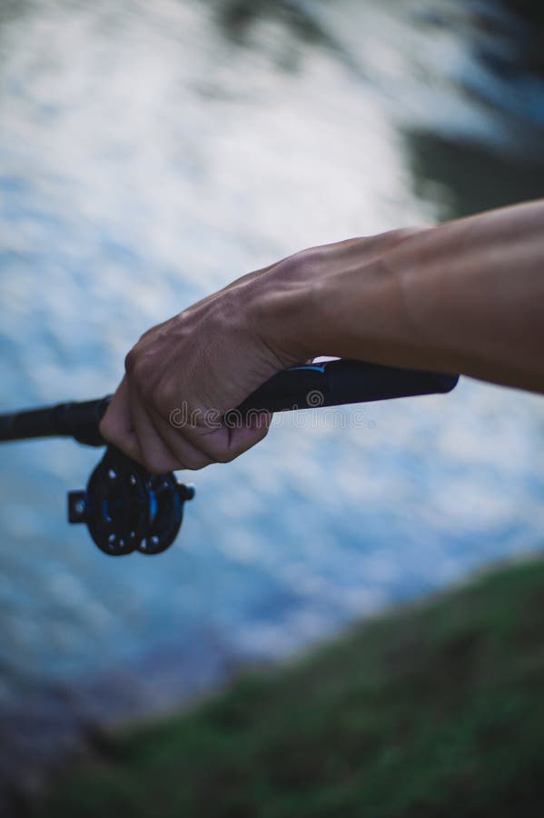 Close-up of a Fisherman S Hand Pulling a Fish Hook Stock Photo - Image ...