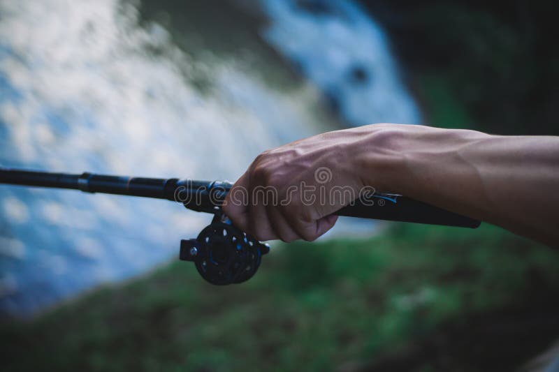 Close-up of a Fisherman S Hand Pulling a Fish Hook Stock Photo - Image ...