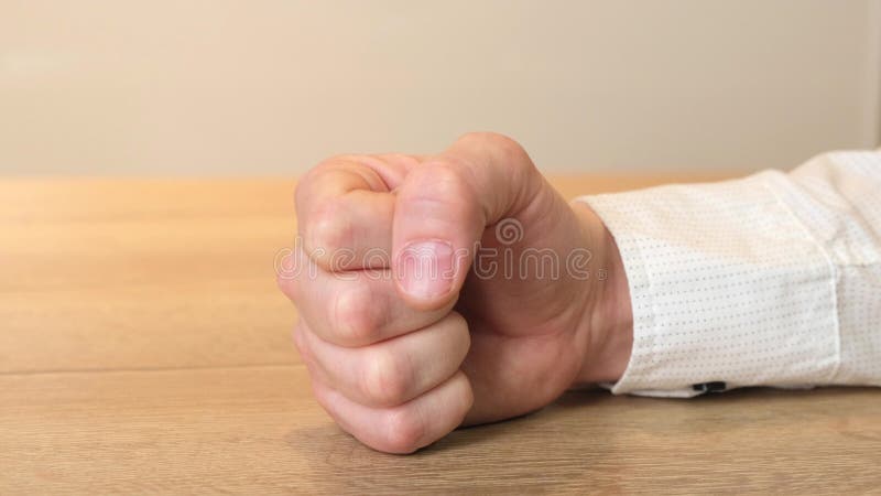 Close Up Fist of Angry Man Beats on the Table. Close Up. Stock Image ... Close Up Fist of Angry Man Beats on the Table. Close Up. Stock Image ...