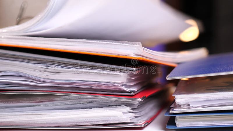 Searching for the Desired Document in a Stack of Documents, Folders ...