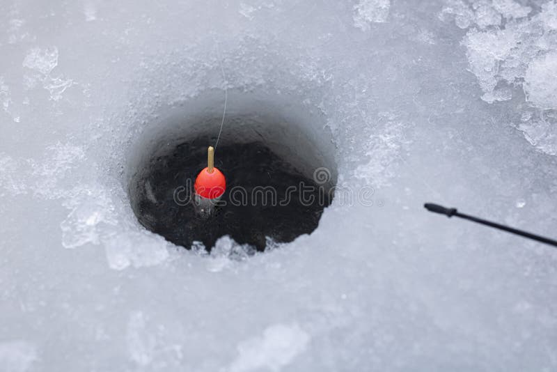 Close-up of a Float in a Hole in the Ice. Winter Fishing Smelt. Stock ...
