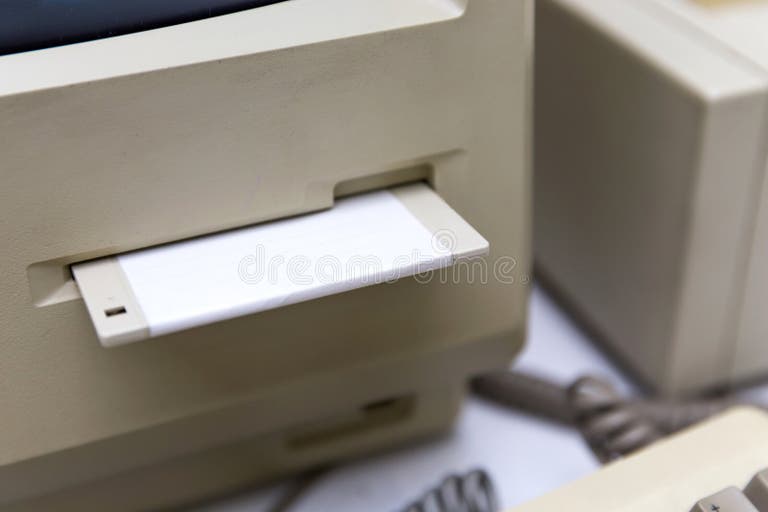 Close Up of Floppy Disk Insert into the Drive a of the Old Computer ...