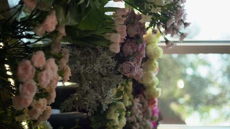 Close-up of a Florist Using Greenery for Arrangements in His Flower ...