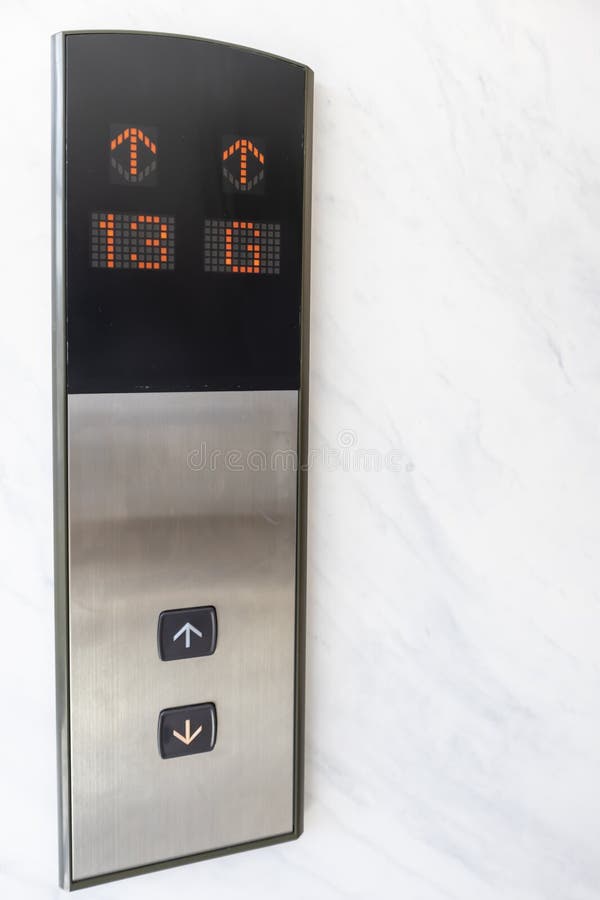 Close-up Focus of the Elevator Up and Down Buttons and Floor Numbers Stock Photo - Image of ...