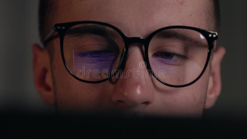 Reflection Of Eyeglasses On Computer Programmer S Face While Analyzing Big Data On A Computer
