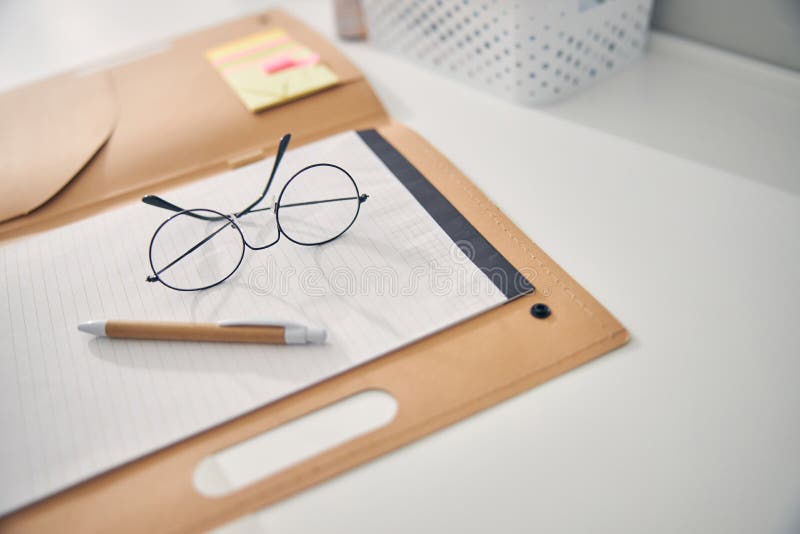 Focused Photo on Glasses Being on the Paper Sheet Stock Photo - Image ...