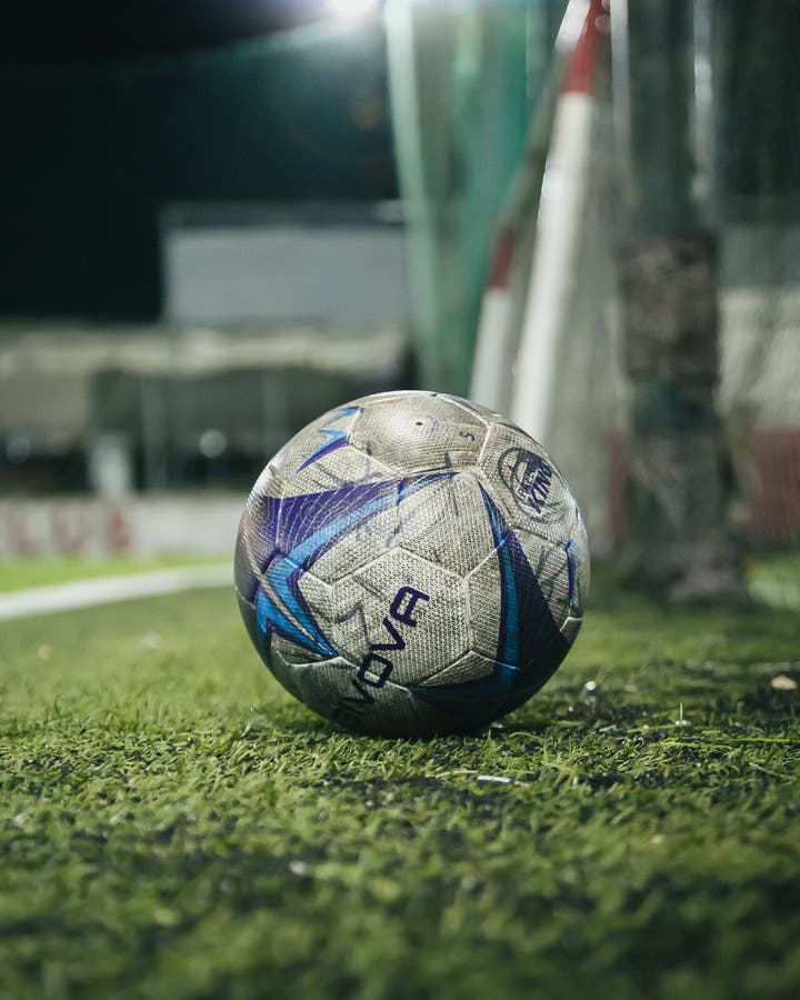 Close Up of a Football Ball in a Grass Field Editorial Stock Image ...