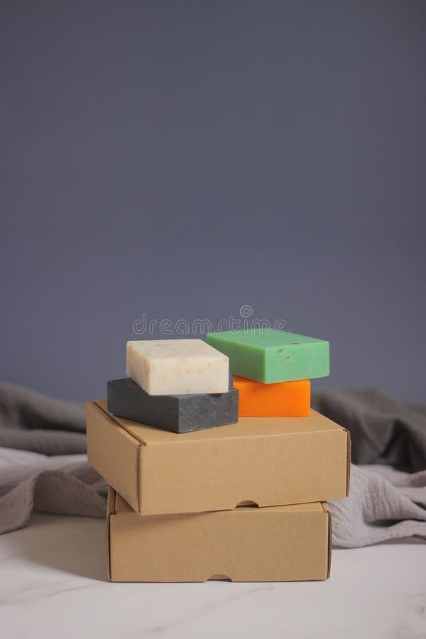 Close-up of Four Soaps Neatly Stacked on Top of Rectangular Boxes Stock ...