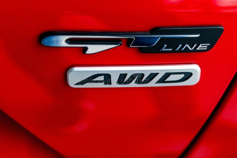 Close Up Four-wheel Drive 4x4 Sign on a New Orange Ford Ranger ...