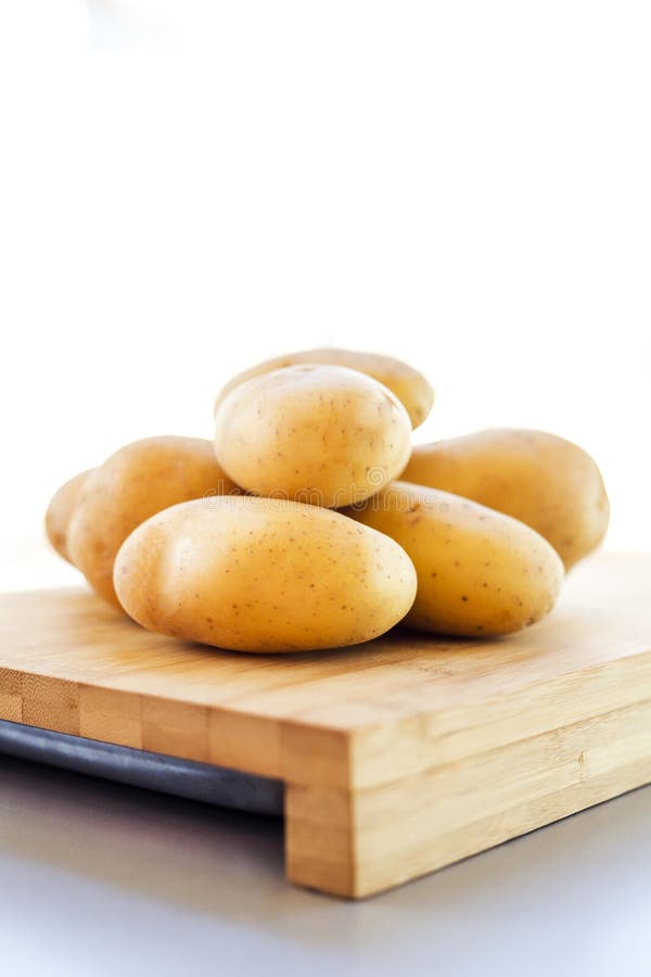 Close Up Potatoes on Kitchen Table Stock Photo - Image of carbohydrate ...
