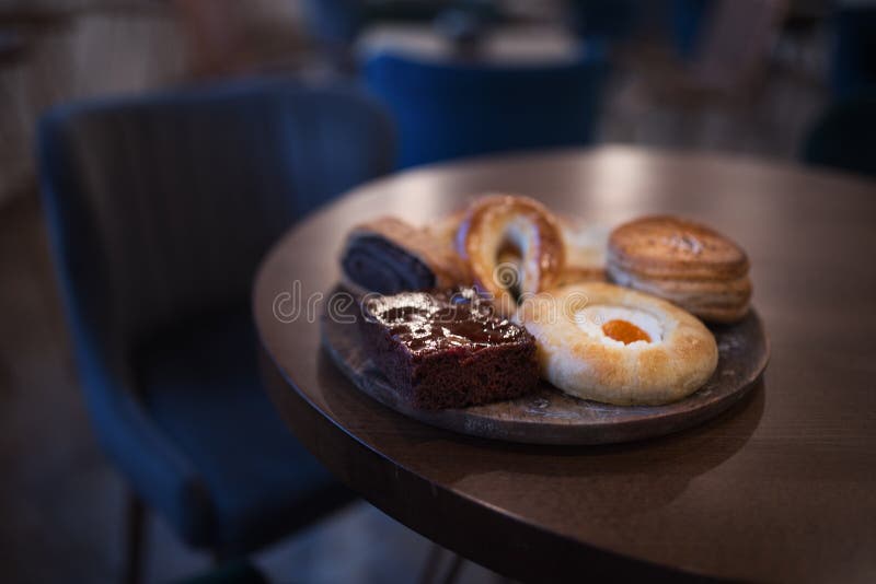 Close-up of Fresh Sweet Pastry on Table in a Cafe. Stock Photo - Image ...