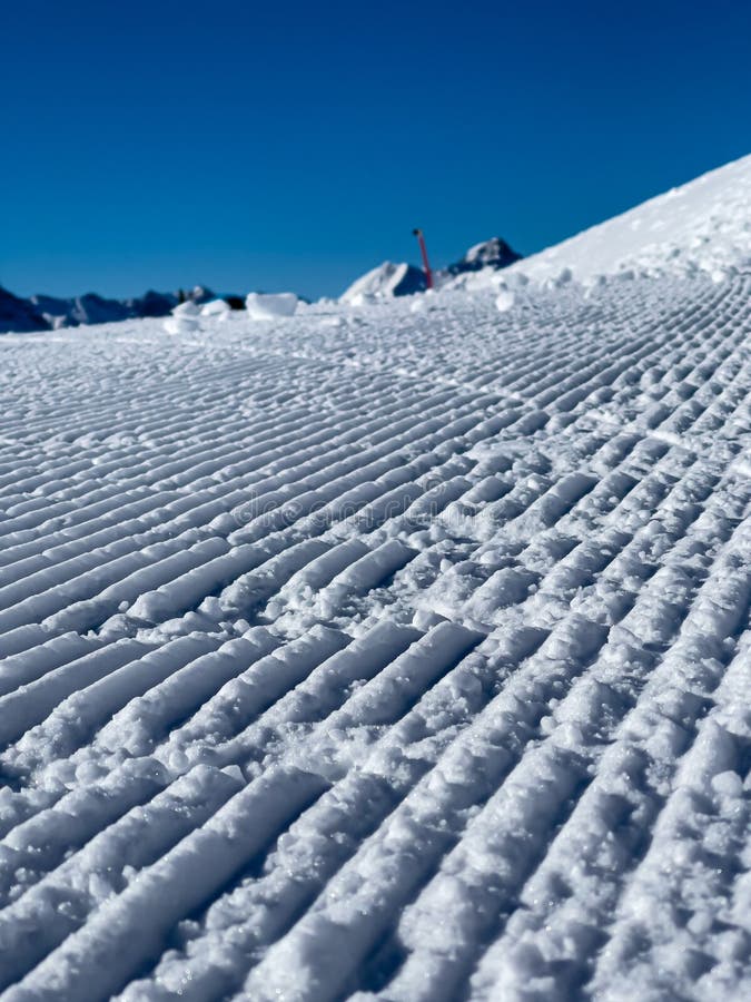A Close Up of Freshly Groomed Snow Slope Stock Photo - Image of europe ...