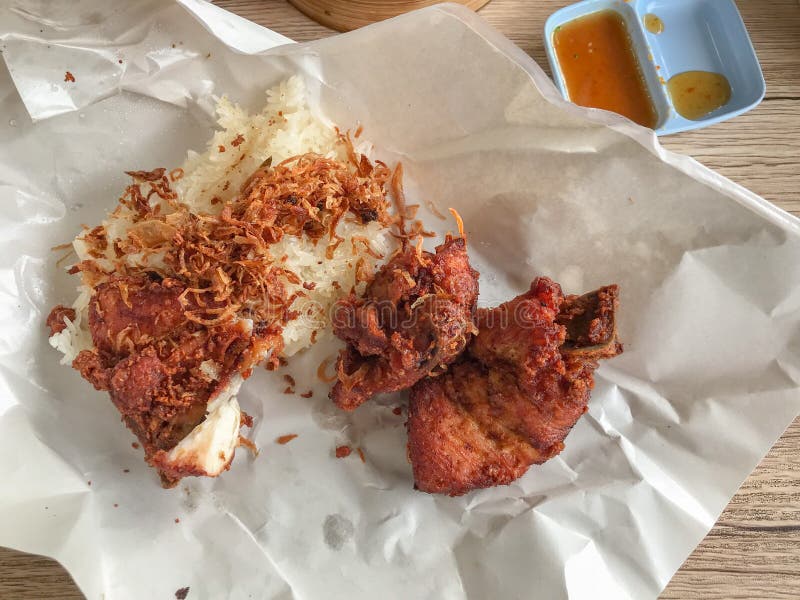 Fried Chicken and Sticky Rice on Paper Wrap Stock Photo - Image of ...