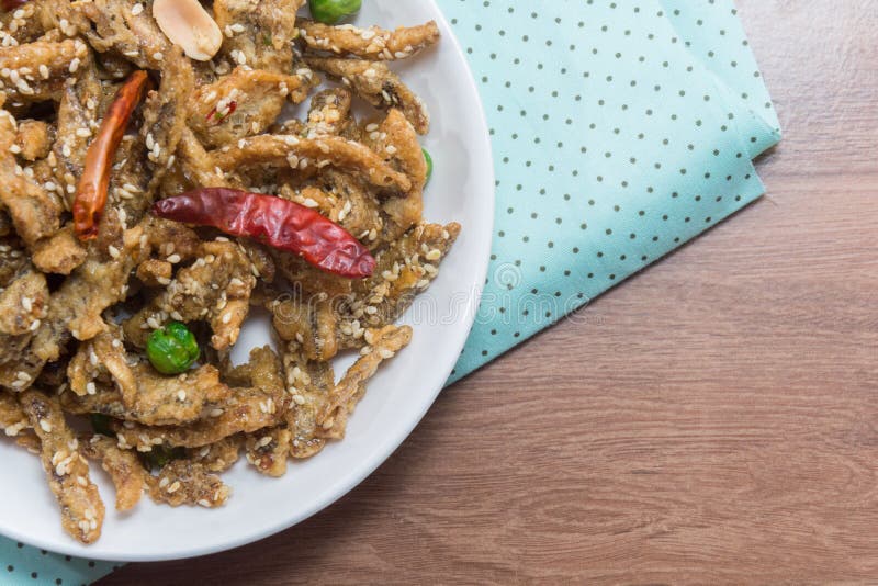 Fried Crispy Tiny Fish on Plate Stock Image - Image of closeup, fried ...