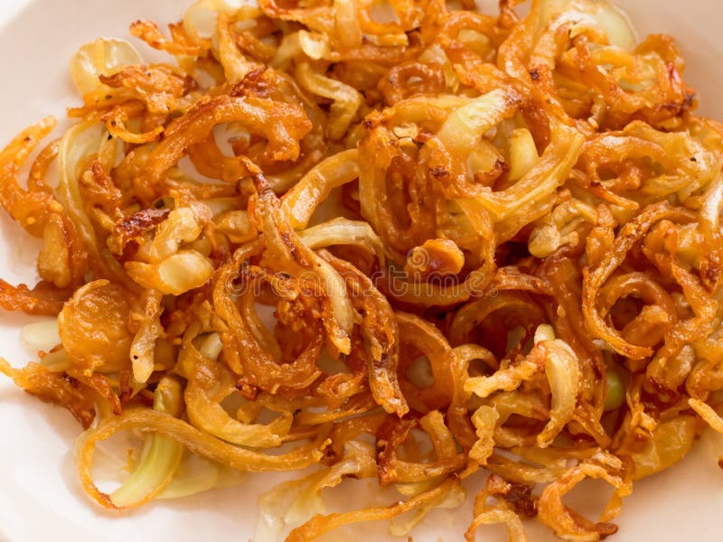 Fried Onion on a White Background Stock Photo - Image of tasty, snack ...