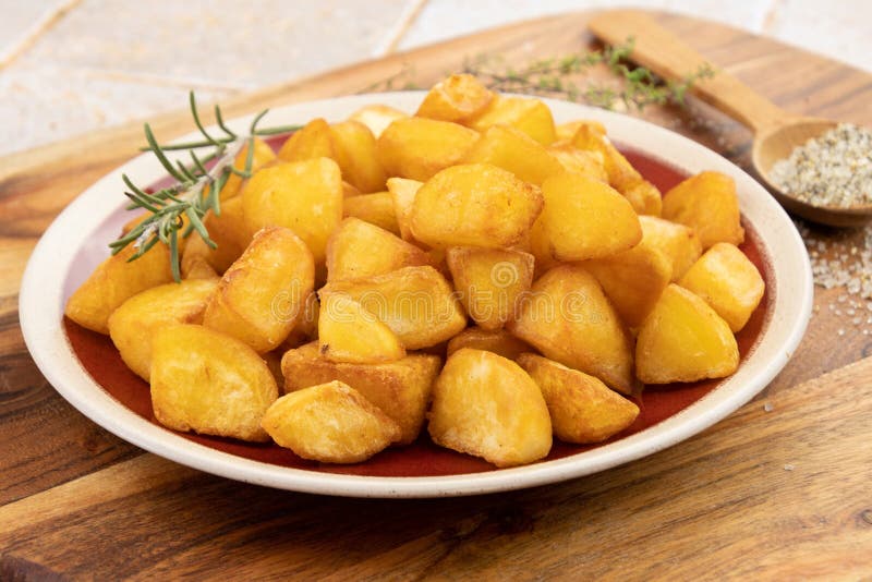 Fried Potato Pieces on a Plate Stock Image - Image of browns, pieces ...