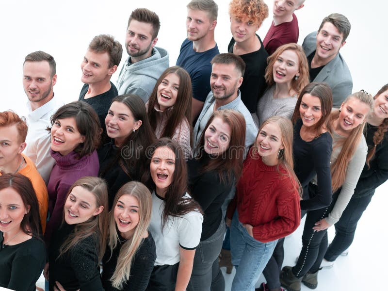 Close Up. a Friendly Group of Young People Looking Forward Stock Photo ...