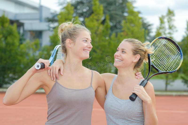 Close Up Friends Playing Tennis Stock Photo - Image of activity, summer ...