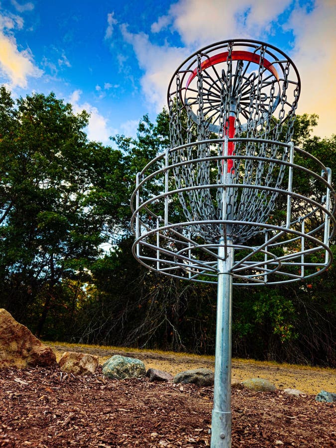 Close Up of Disc Golf Basket on a Course with Blue Sky Stock Image ...