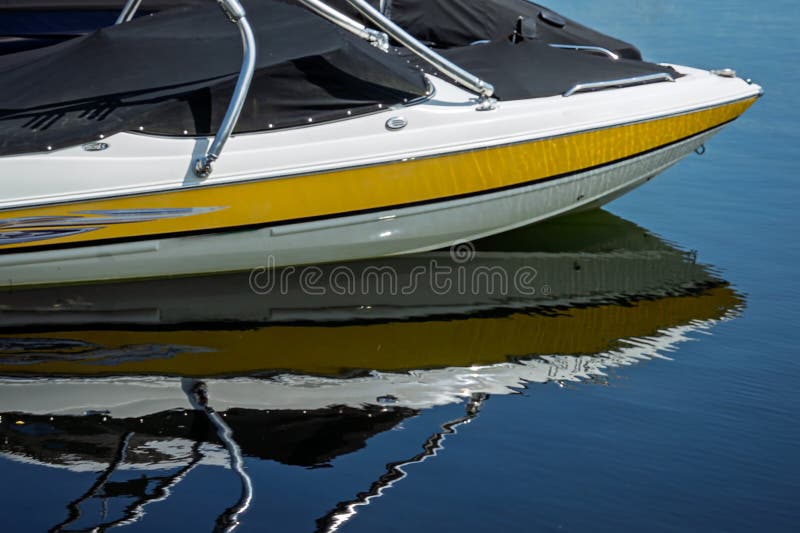 Close View of the Front of a Speedboat and Its Reflection in the Water ...