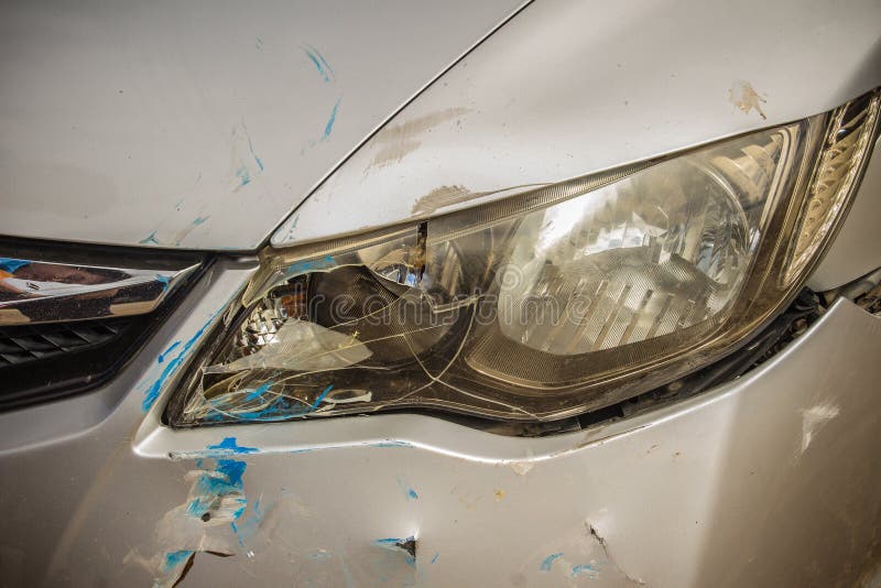 Close-up Front of New Silver Car Distorted by Accident. Crashed Stock ...