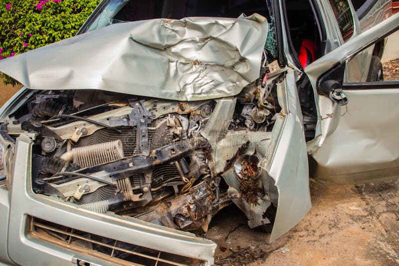 Close-up Front of New Silver Car Distorted by Accident. Crashed Stock ...