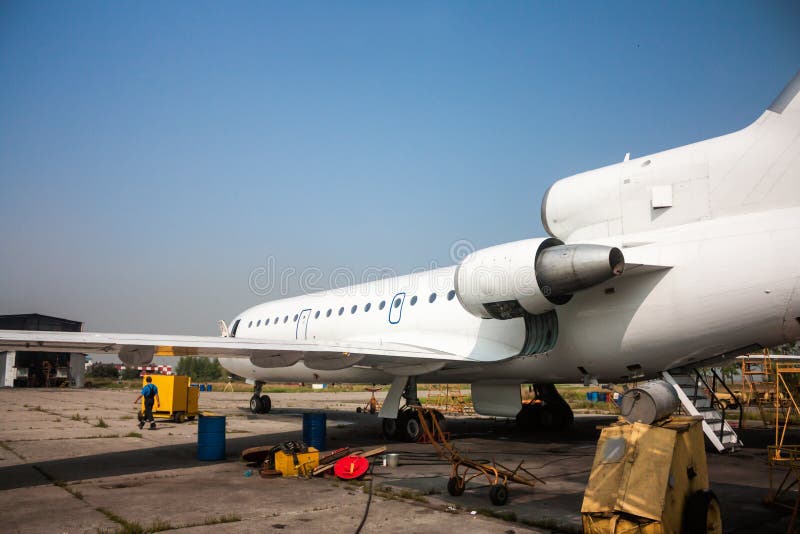 Close-up of the Front of a Passenger Airplane with an Open Door on the ...
