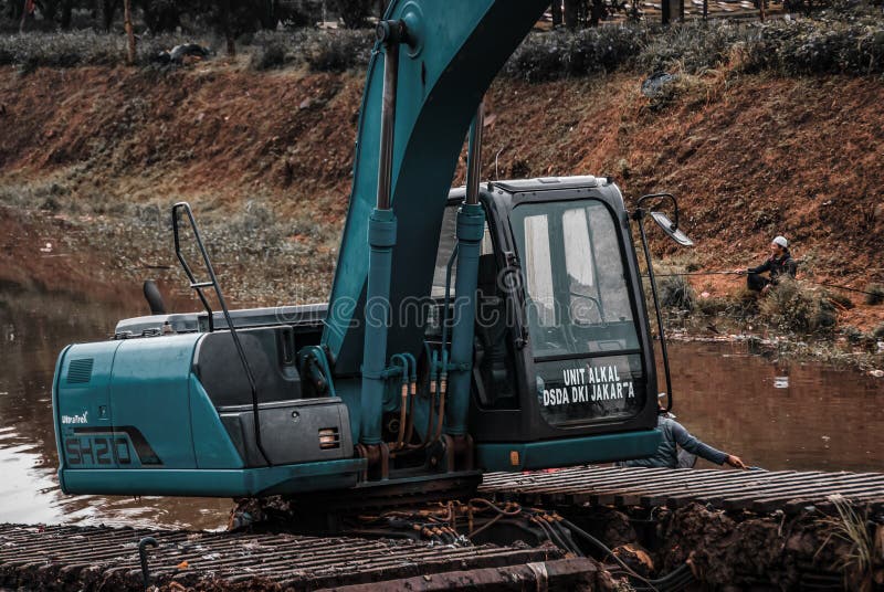 Blue Excavator Digger Working At Night On Street Stock Image - Image of ...