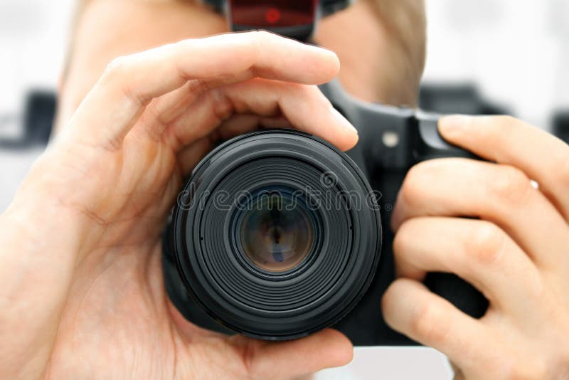 Close Up Front View of Man Holding Camera Stock Photo - Image of artist ...