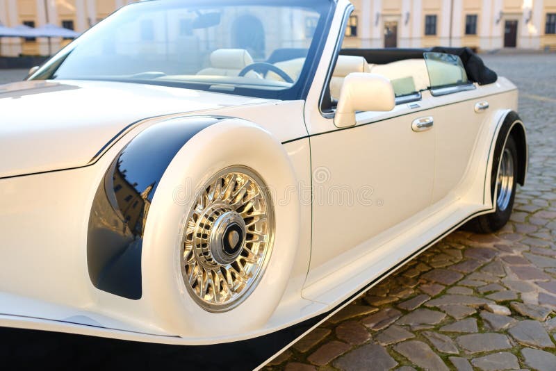 Close-up of the Front of a White Vintage Car in the Courtyard of the ...