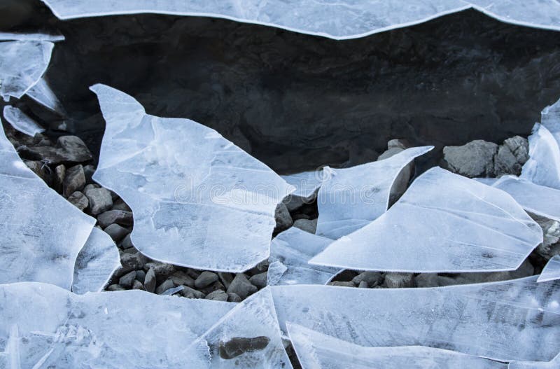 Close Up on Frozen Ice Plaques on Lake in Wintertime, Background ...