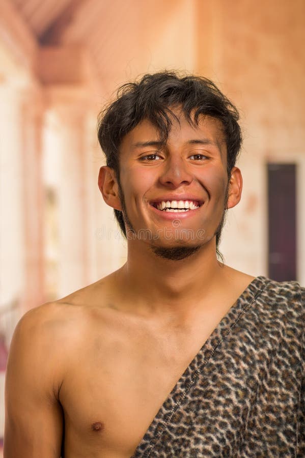 Close Up of Funny Prehistoric Man Smiling To the Camera in a Blurred ...