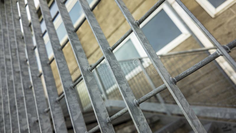 Galvanized Steel Railing Protecting Building Access with Blurred ...