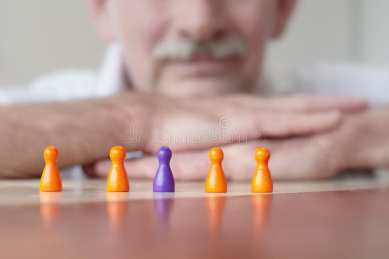 Close-up of Game Pieces on Table and Businessman Stock Image - Image of ...
