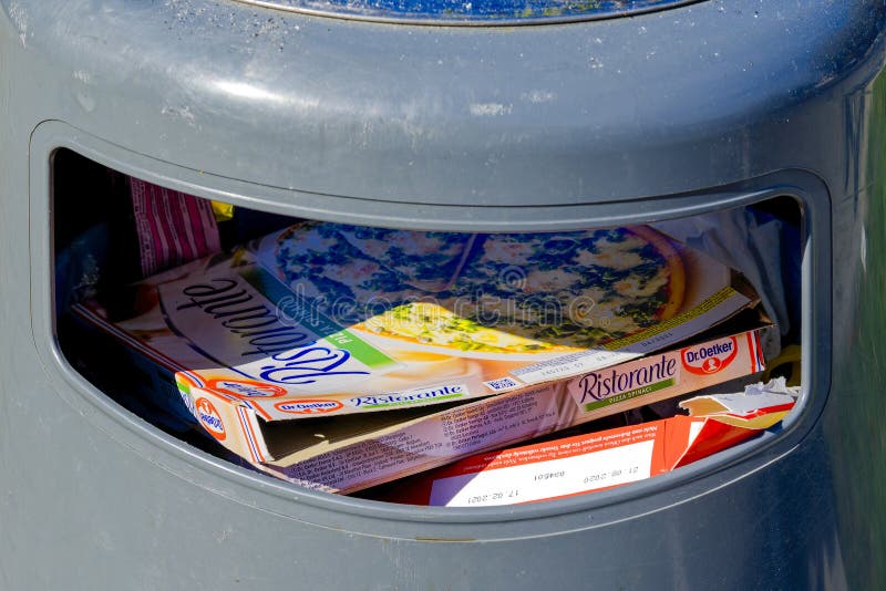 Close-up of a Garbage Can Containing Empty Cardboard Food Boxes ...
