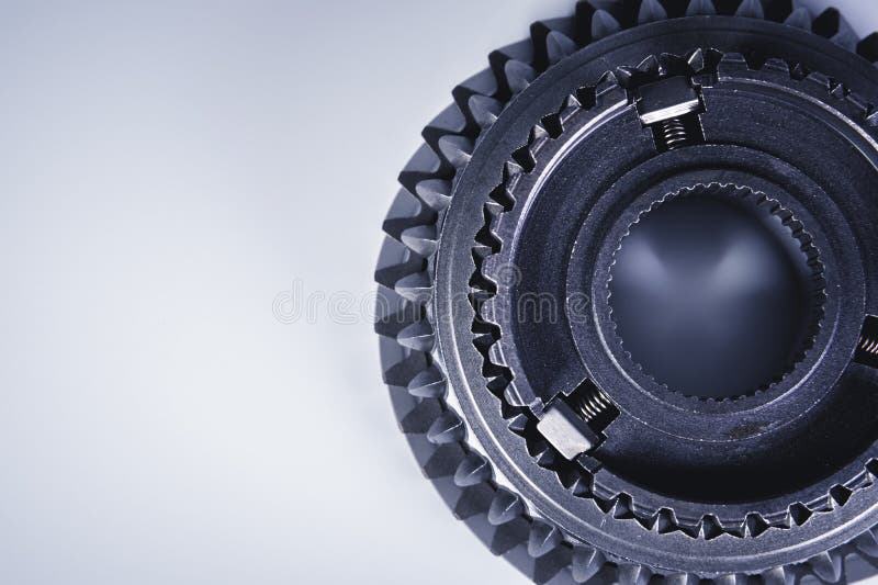 Close-up of a Gear Wheel in a Gearbox on a Gray Background. Mechanical ...