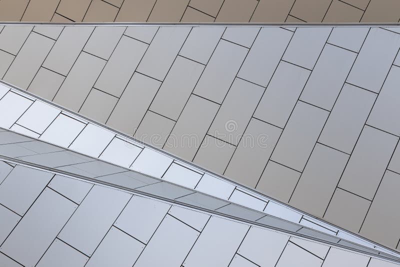 Close-up of Geometrically Designed Building with White Tiled Walls and ...