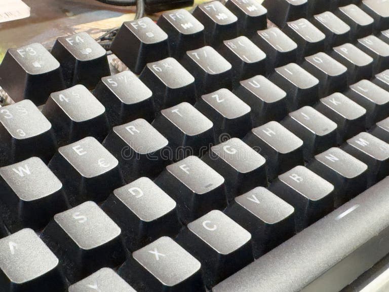Close-up of German Keyboard with Dust on Black Keys Stock Image - Image ...