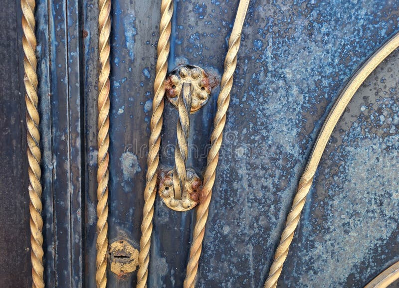 Close-up of a Gilded Iron Gate Handle with a Twisted Pattern. Stock ...