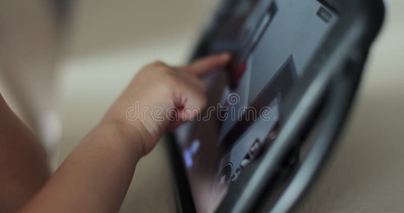 Close Up of a Girl Hand is Playing Using Digital Computer Tablet ...