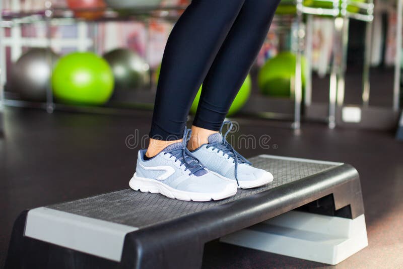 Close Up, Girl Performs Step Cardio with Dumbbells in a Gym Stock Image ...
