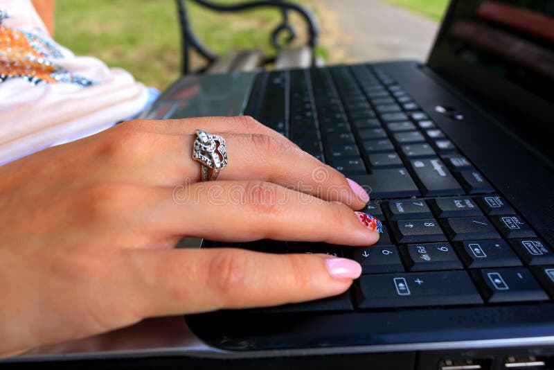 Close Up of Girls Hand with Notebook on Bench Stock Photo - Image of ...