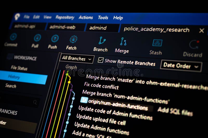 Close-up of Git GUI Application Showing Repository Branches, Merge History, and Update Logs ...