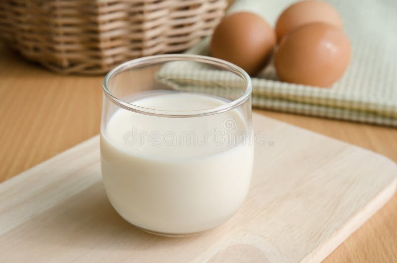 Close Up Glass of Milk Onwooden Table Stock Photo - Image of table ...