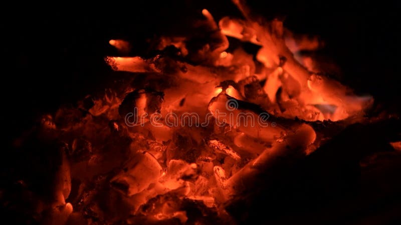 Close Up of Glowing Burning Embers in Fire Pit on Black Background ...