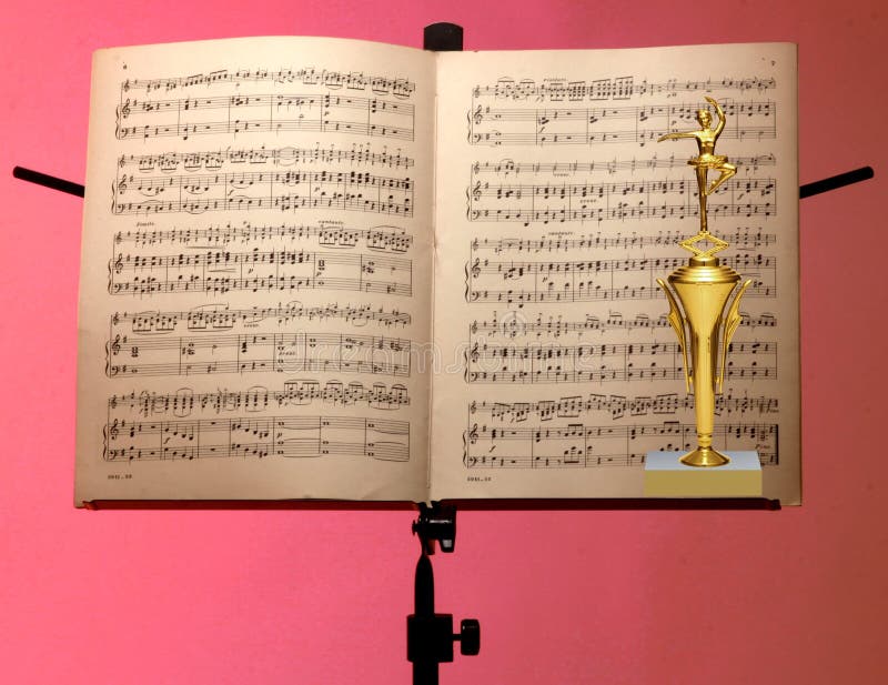 Close Up of Gold Trophy and Music Note Stand. Stock Photo - Image of ...