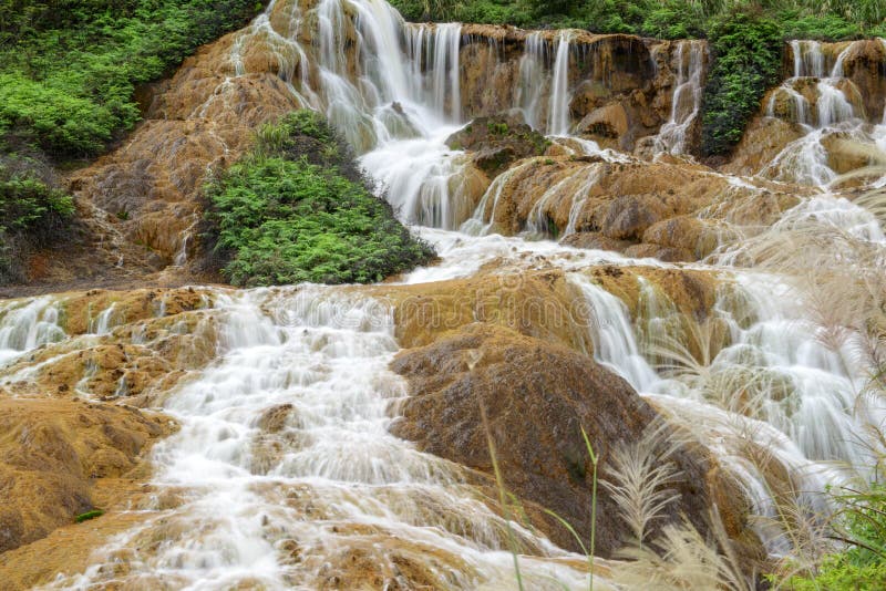 Golden Water Fall stock photo. Image of rush, jungle - 98634352