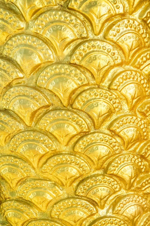 Golden Yellow Serpent Scale Statue Texture With Seamless Patterns For Background Stock Image