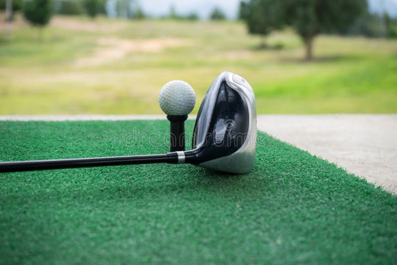 Close-up of a Golf Ball and a Golf Wood on a Driving Range Stock Image ...