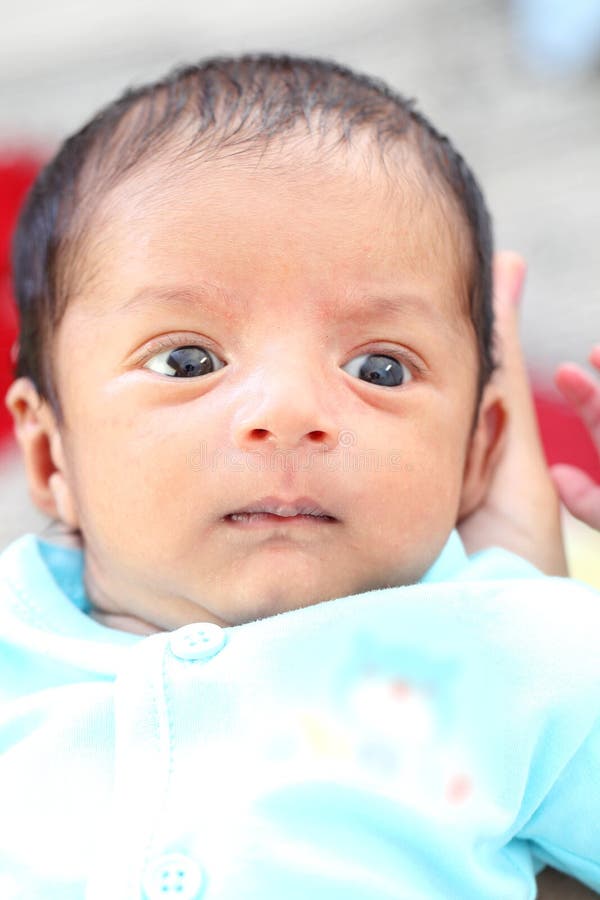 Newborn baby close up stock image. Image of enjoyment - 122396263